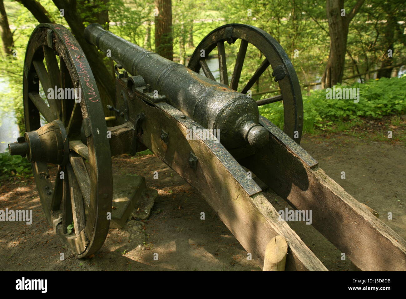 historical story wood iron war wheels force deadly cannon cannon tube ...