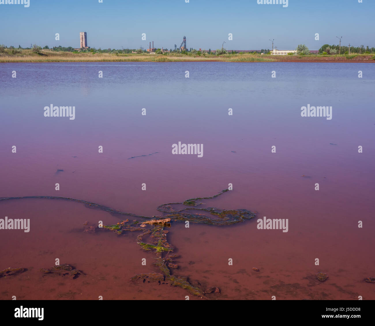 Reservoir of industrial mine water discharge and landscape Stock Photo ...