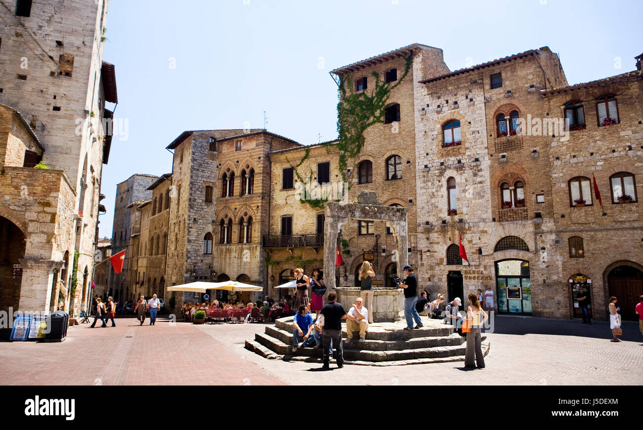 old town tenements tuscany square fountain cistern piazza italy middle ...