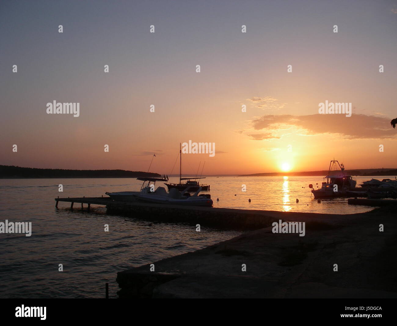 sunset at the port Stock Photo - Alamy