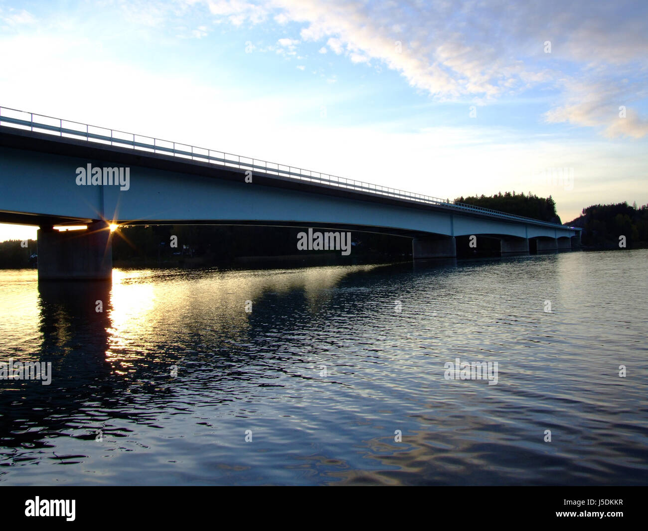 sunset sweden evening motorway highway firmament sky water clouds ...