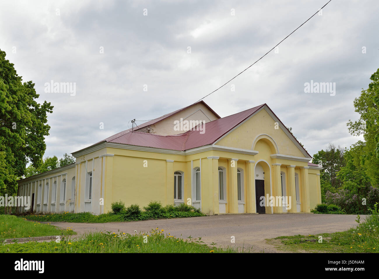 One-story yellow stone building, the House of culture the city ...