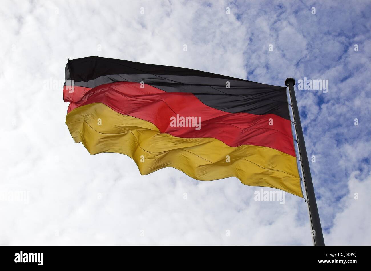 Black red gold flag hi-res stock photography and images - Alamy