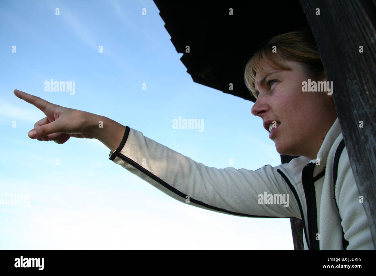 woman make wait waiting blue indicate show finger face extend look ...