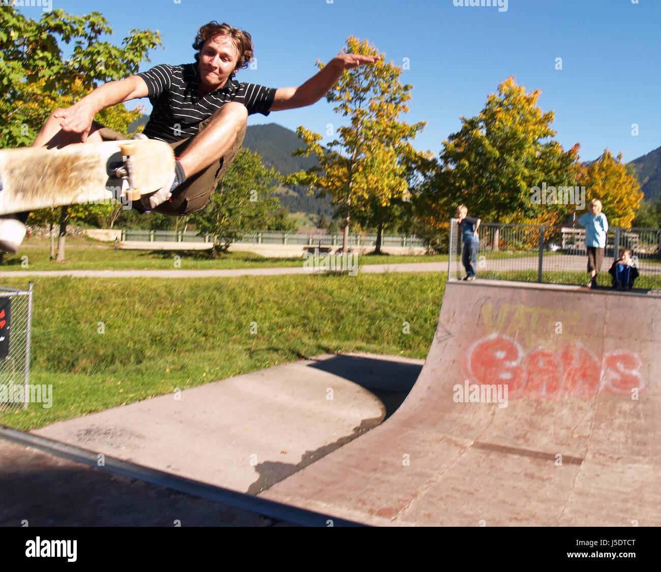 legs danger sport sports tree trees flight green coloured colourful ...