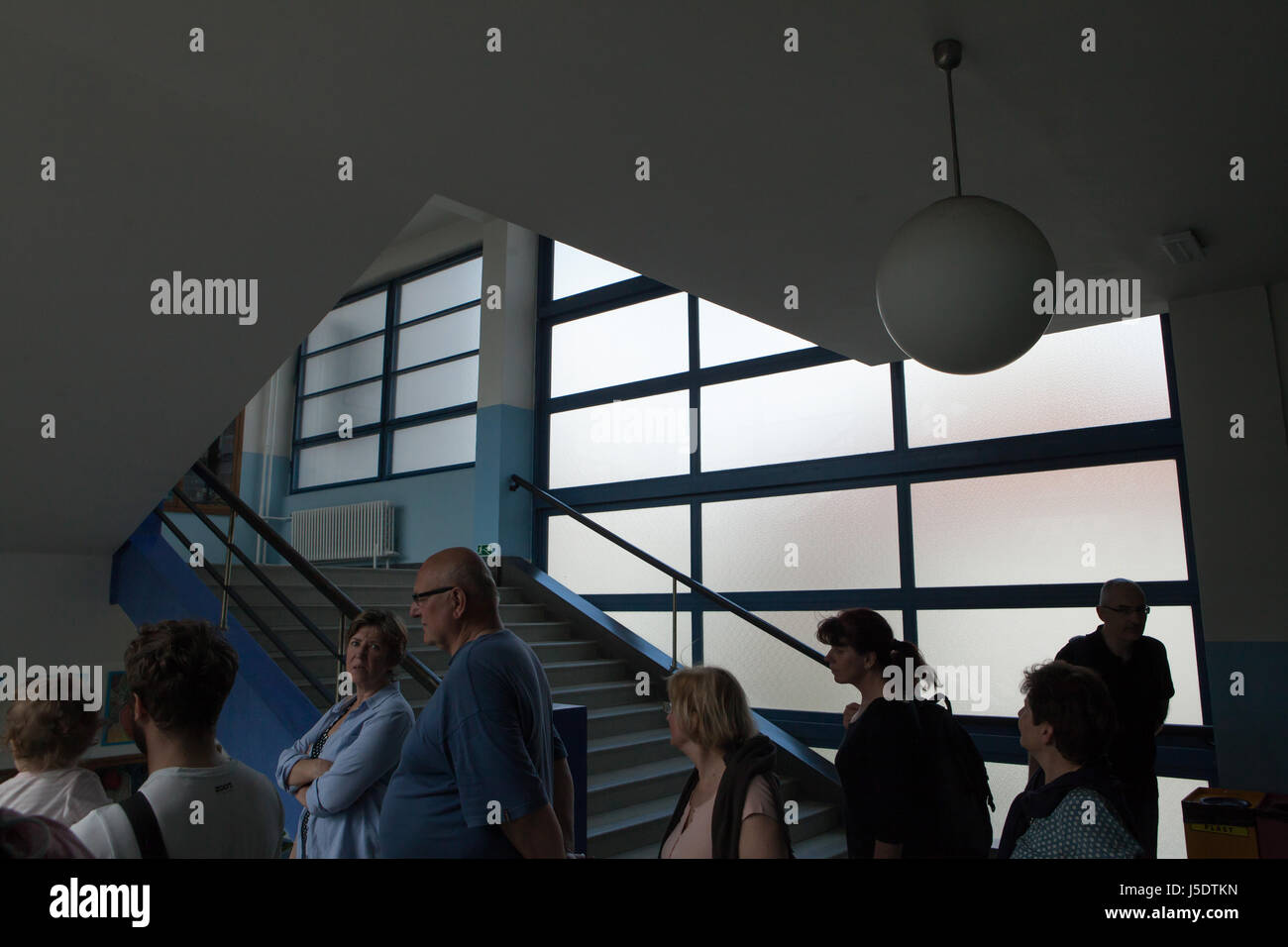 People visit the functionalist staircase of the French Schools ...