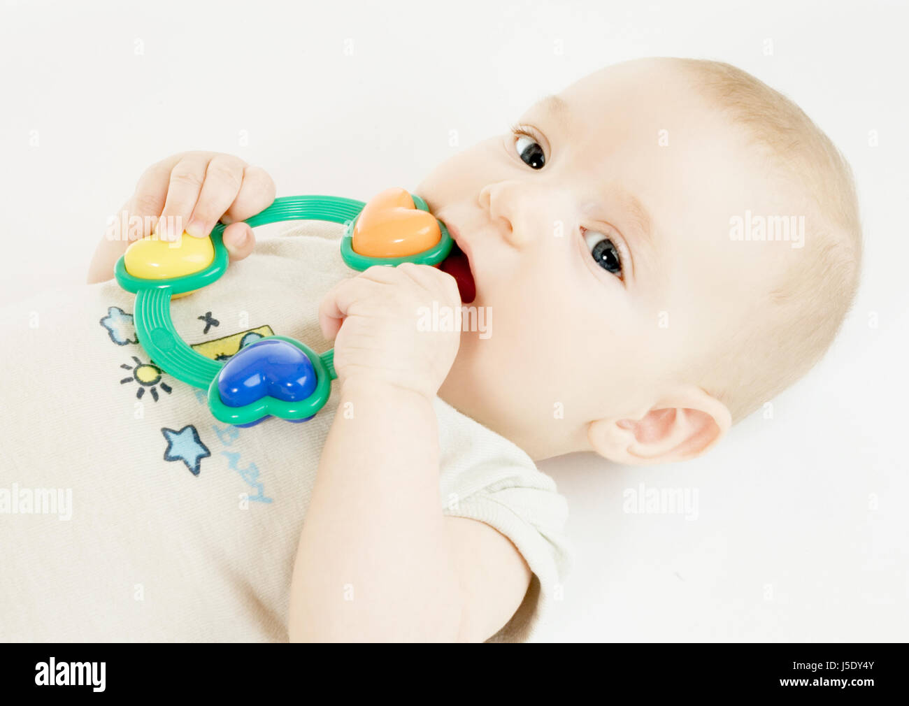 baby with rattle (about 4 months old Stock Photo - Alamy