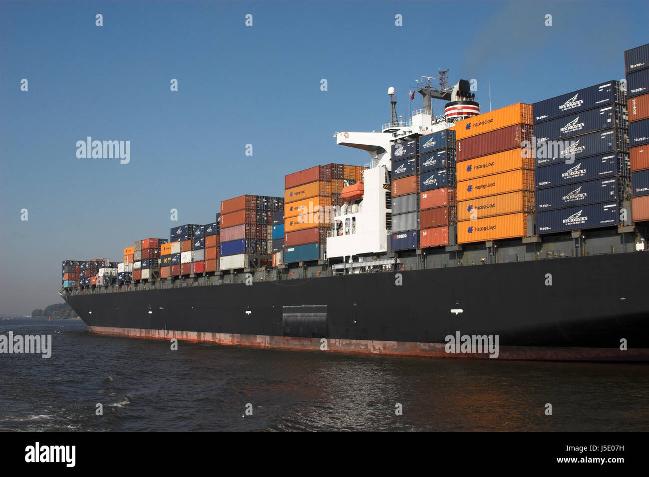 container ship on the elbe Stock Photo - Alamy