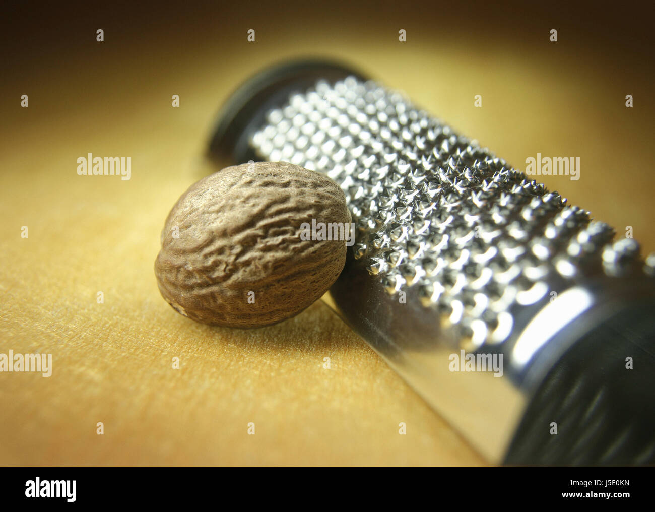 nutmeg and grater Stock Photo - Alamy