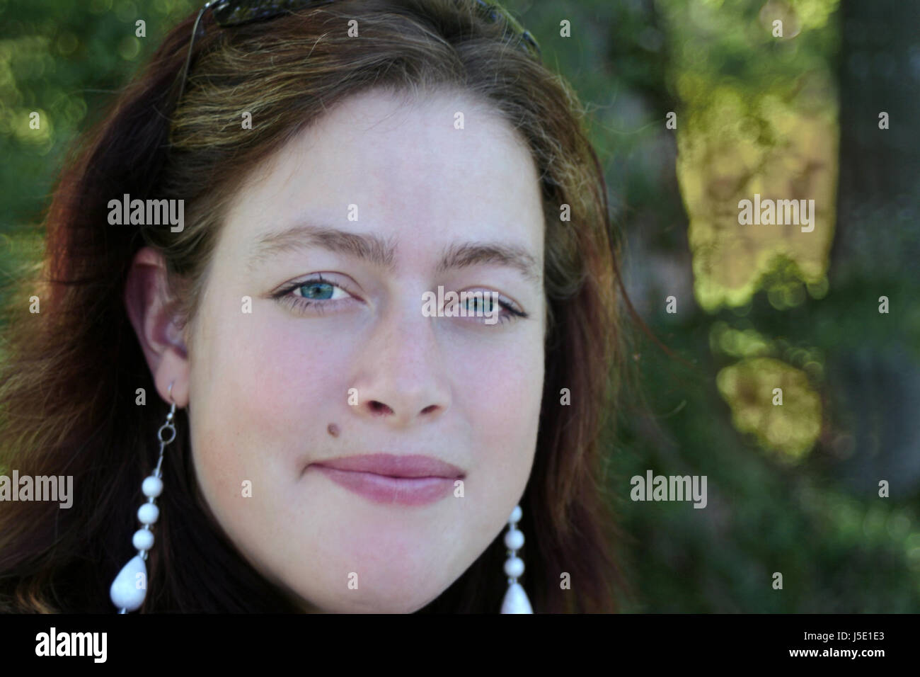 tree trees mouth portrait skin eyes lips outdoor astute busy ...