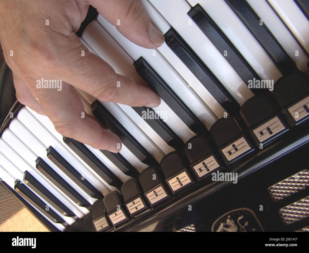 Hand accordion buttons hi-res stock photography and images - Alamy