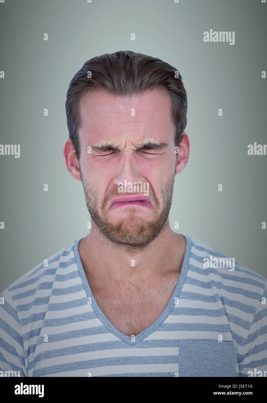 Digital composite of Man crying against light blue background Stock ...