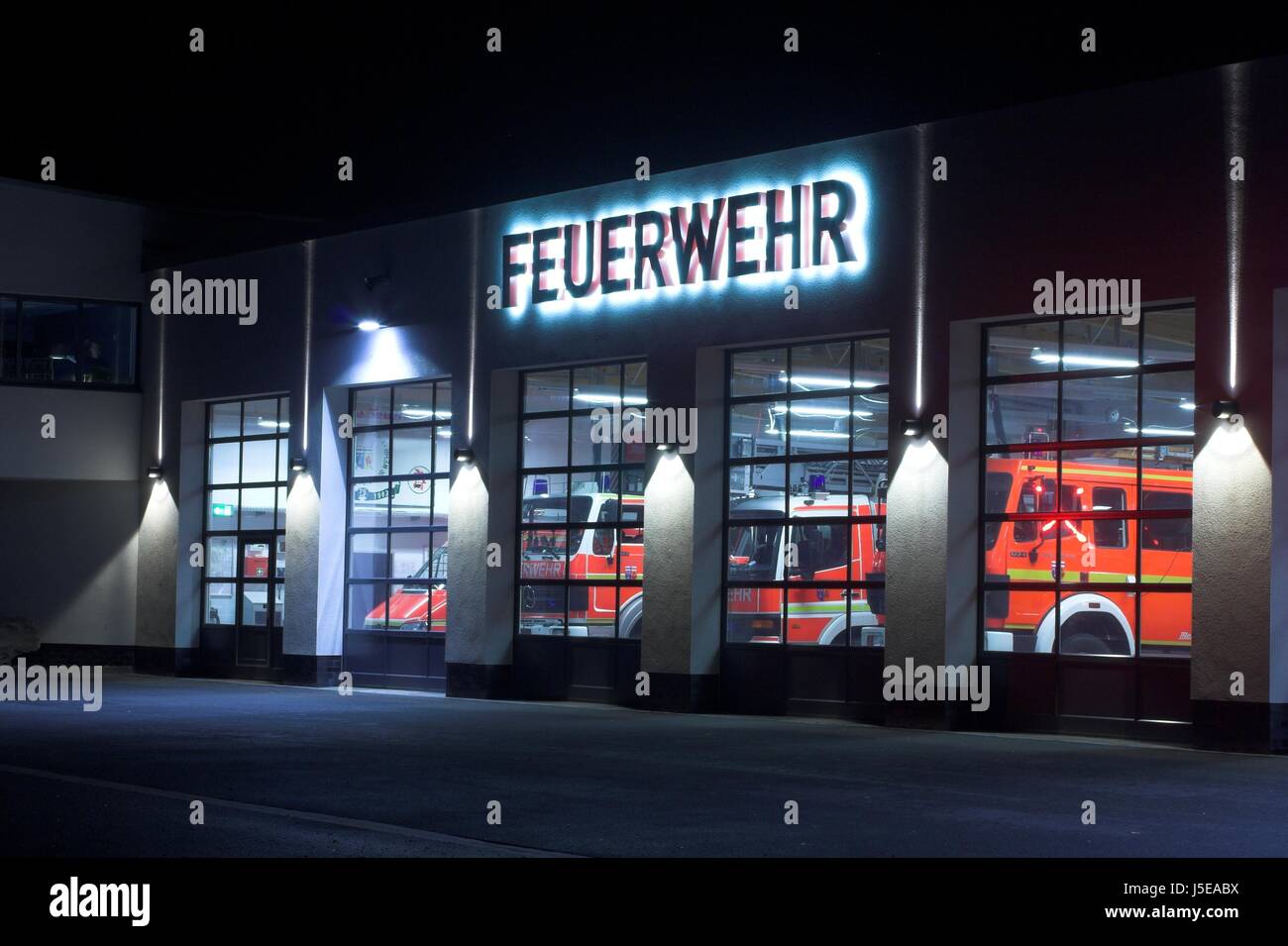 firemen at night Stock Photo - Alamy