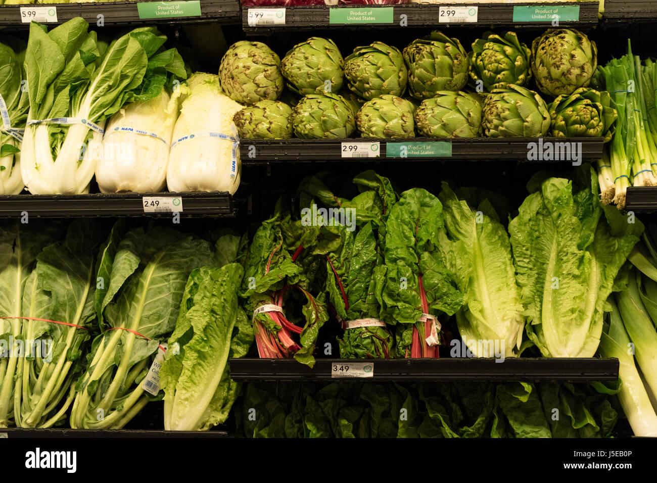 Vegetables and salad produce on a supermarket shelf Stock Photo - Alamy