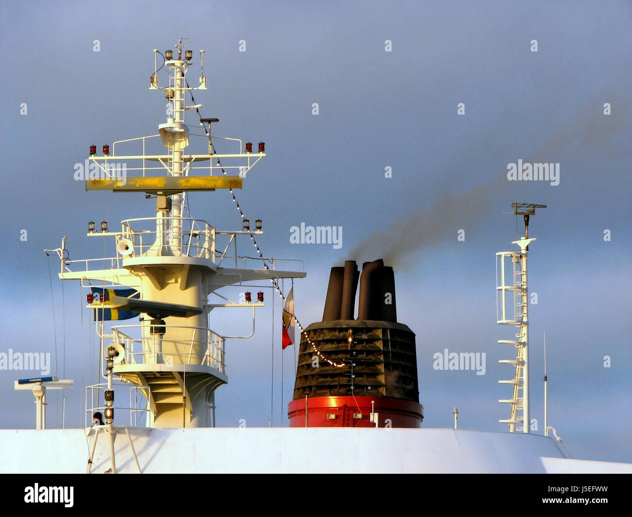 smoke smoking smokes fume steel mast antennae radar ferry-boat ferry ...