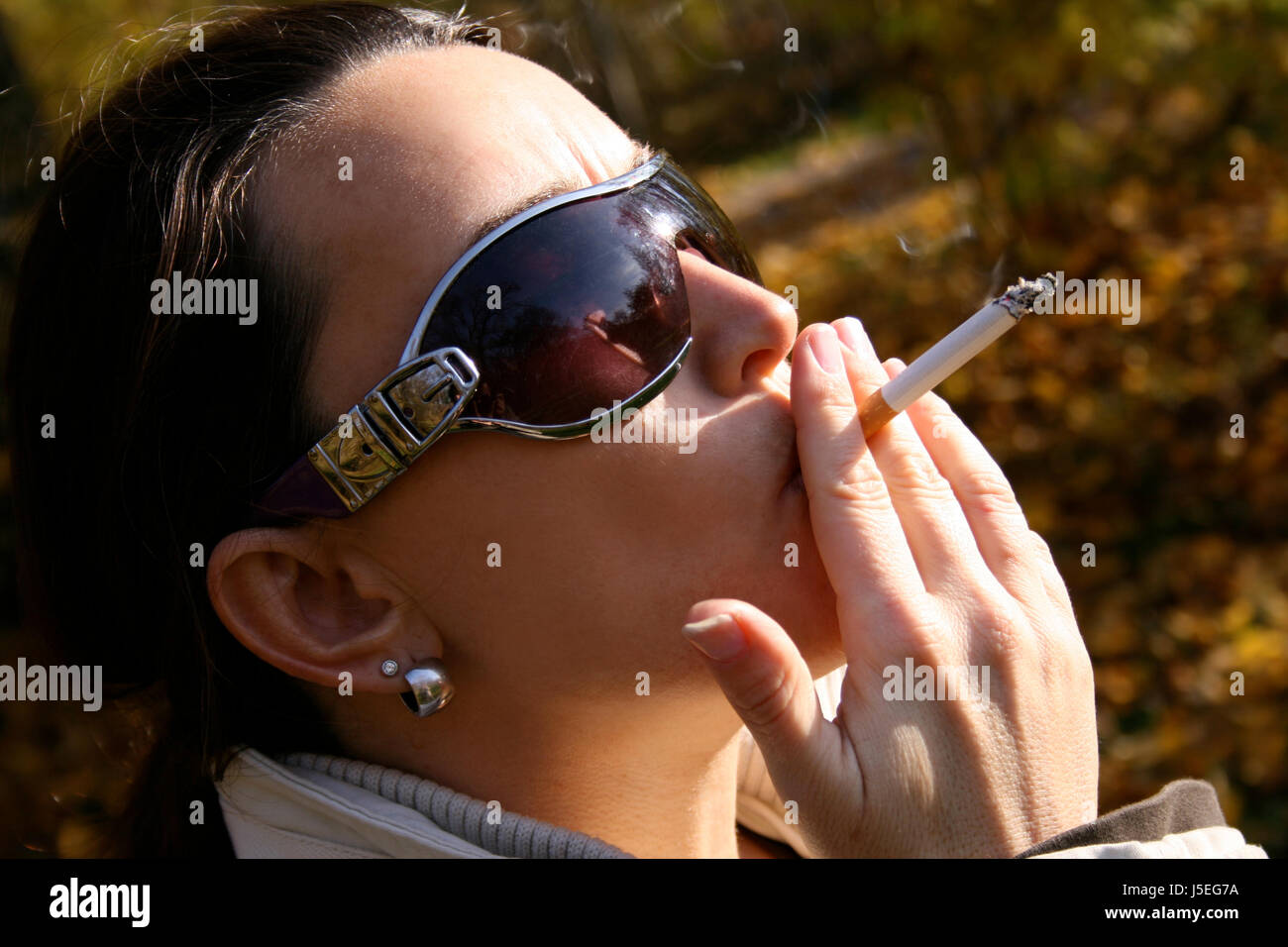 woman smoke smoking smokes fume cigarette humans human beings people ...