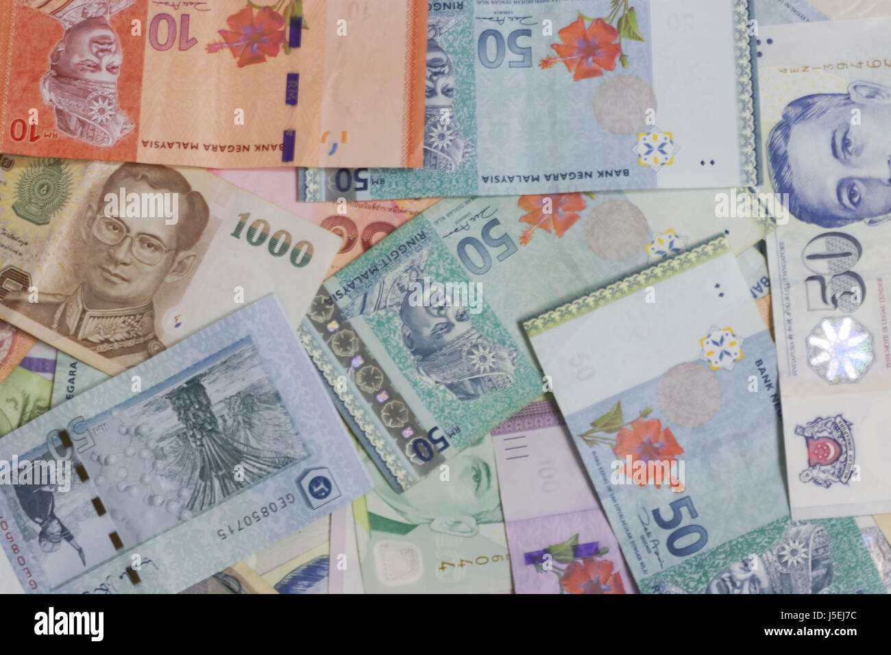 many currencies in asia Stock Photo - Alamy