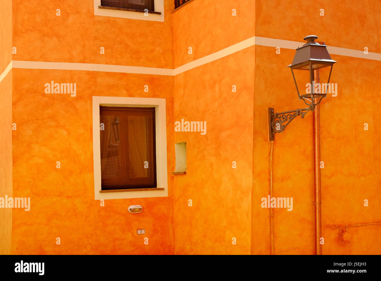 Painted orange house hi-res stock photography and images - Alamy