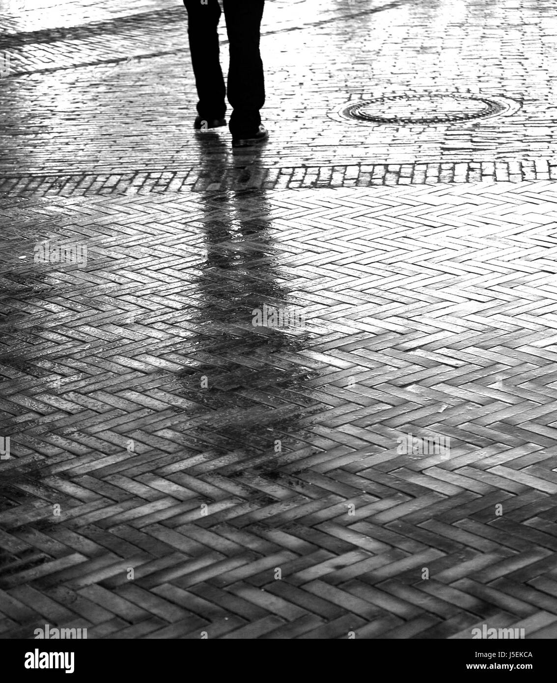 Wet shoes Black and White Stock Photos & Images - Alamy