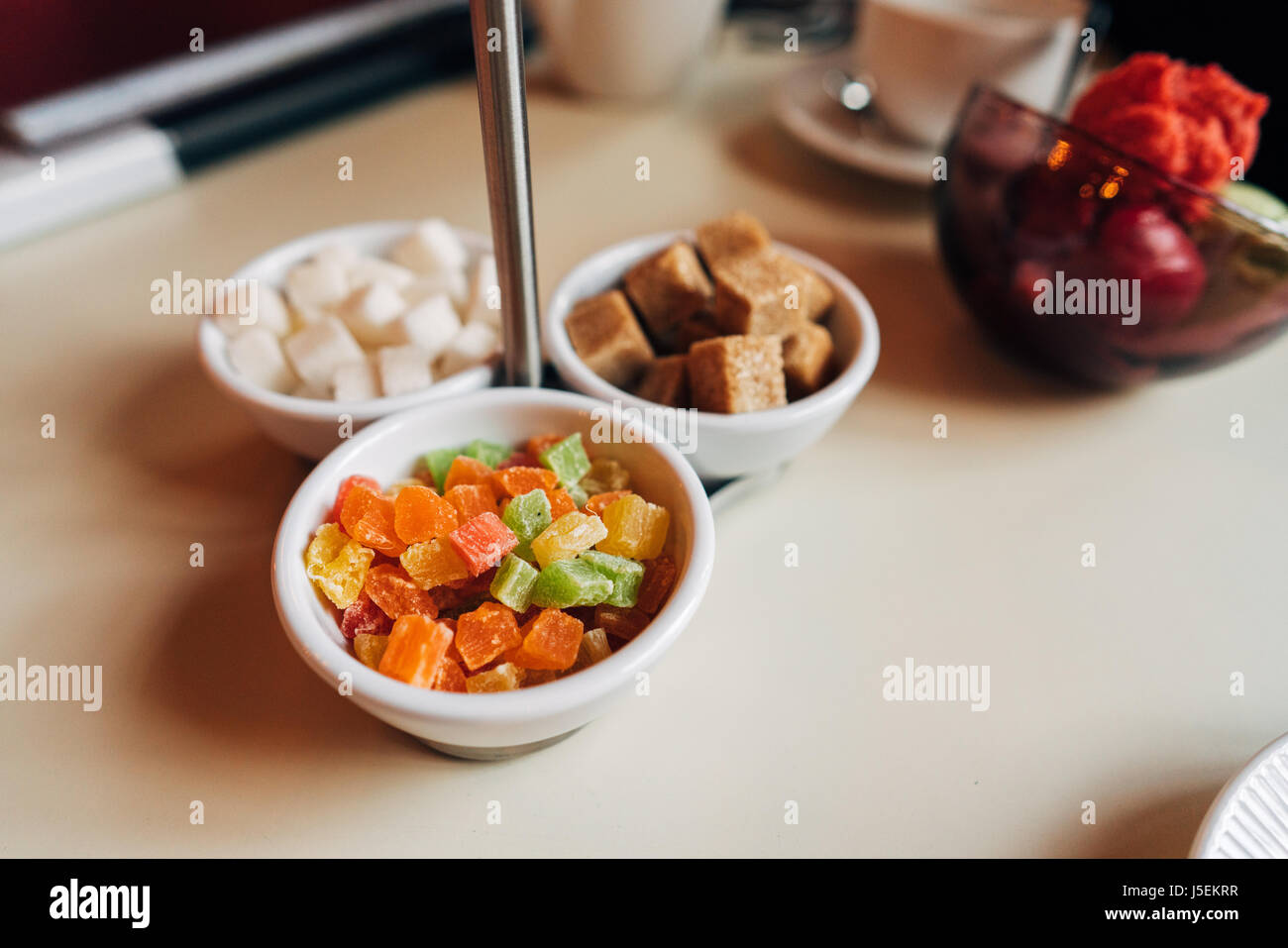 colored fruit sugar on the table Stock Photo - Alamy
