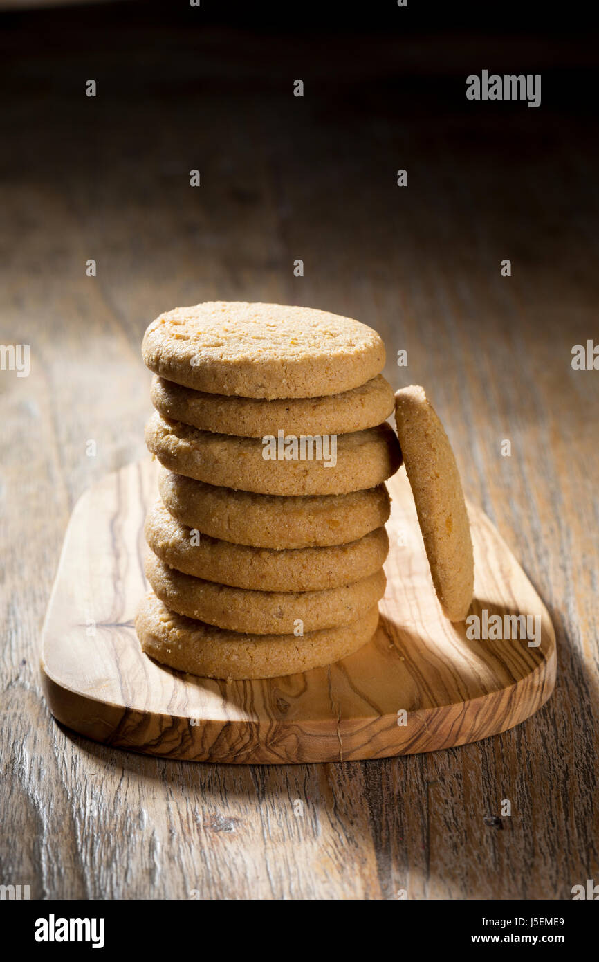 Stack of Biscuits on a rustic wooden table Stock Photo - Alamy