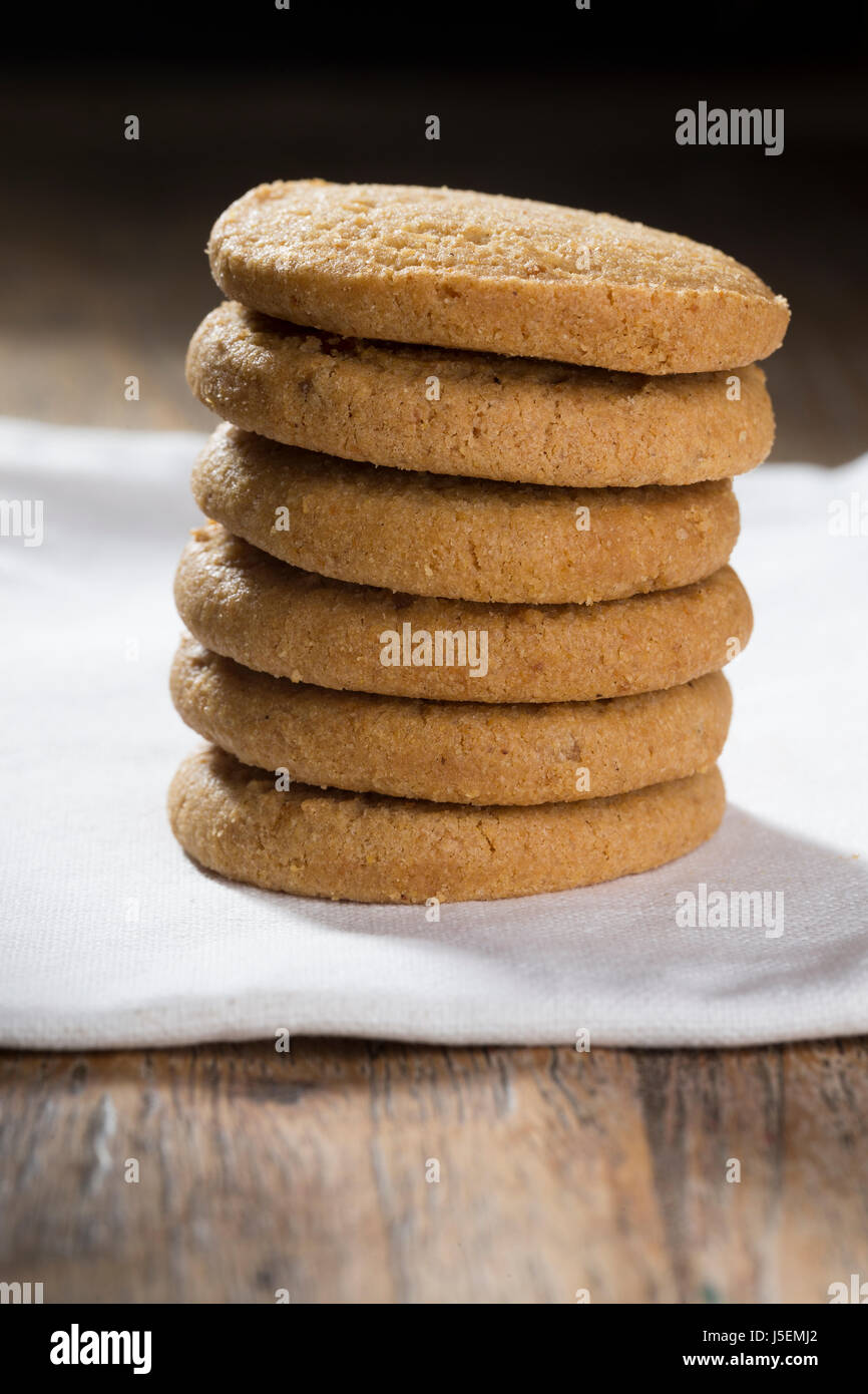 Stack of Biscuits on a rustic wooden table Stock Photo - Alamy