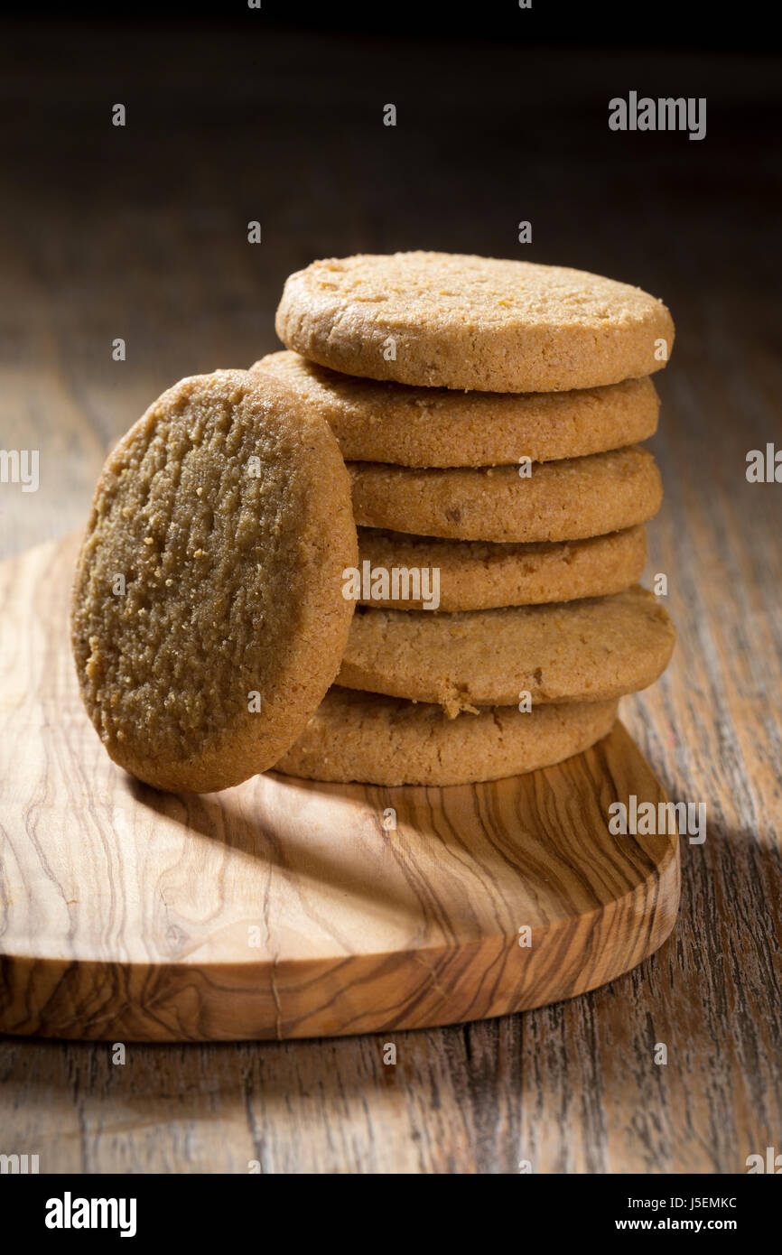 Stack of Biscuits on a rustic wooden table Stock Photo - Alamy