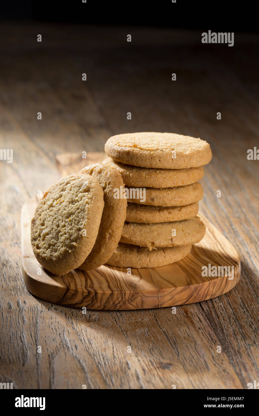 Stack of Biscuits on a rustic wooden table Stock Photo - Alamy