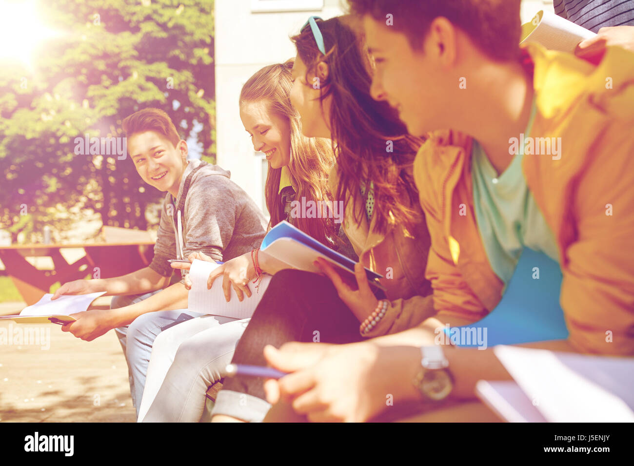 group of students with notebooks at school yard Stock Photo - Alamy