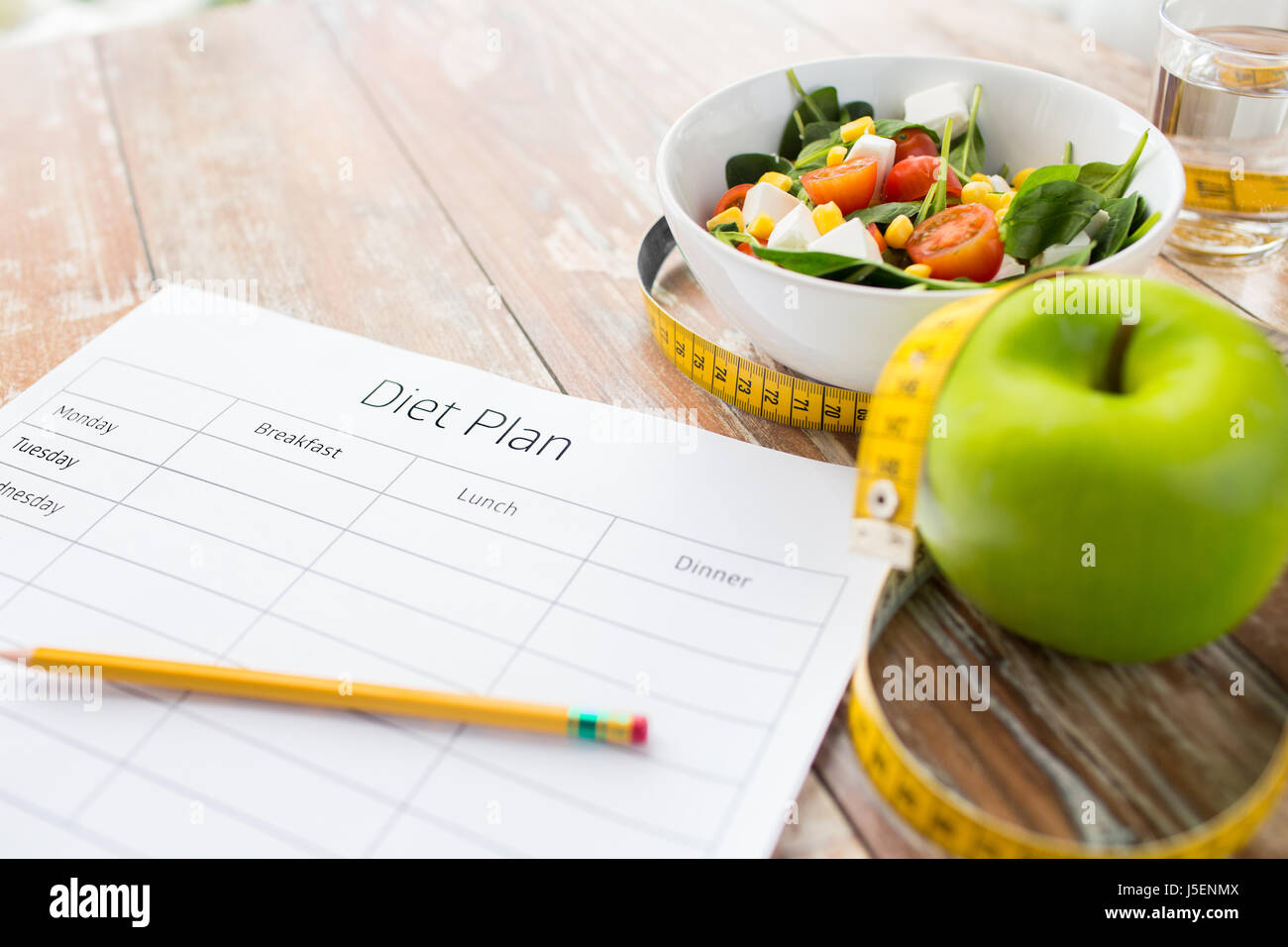 close up of diet plan and food on table Stock Photo - Alamy
