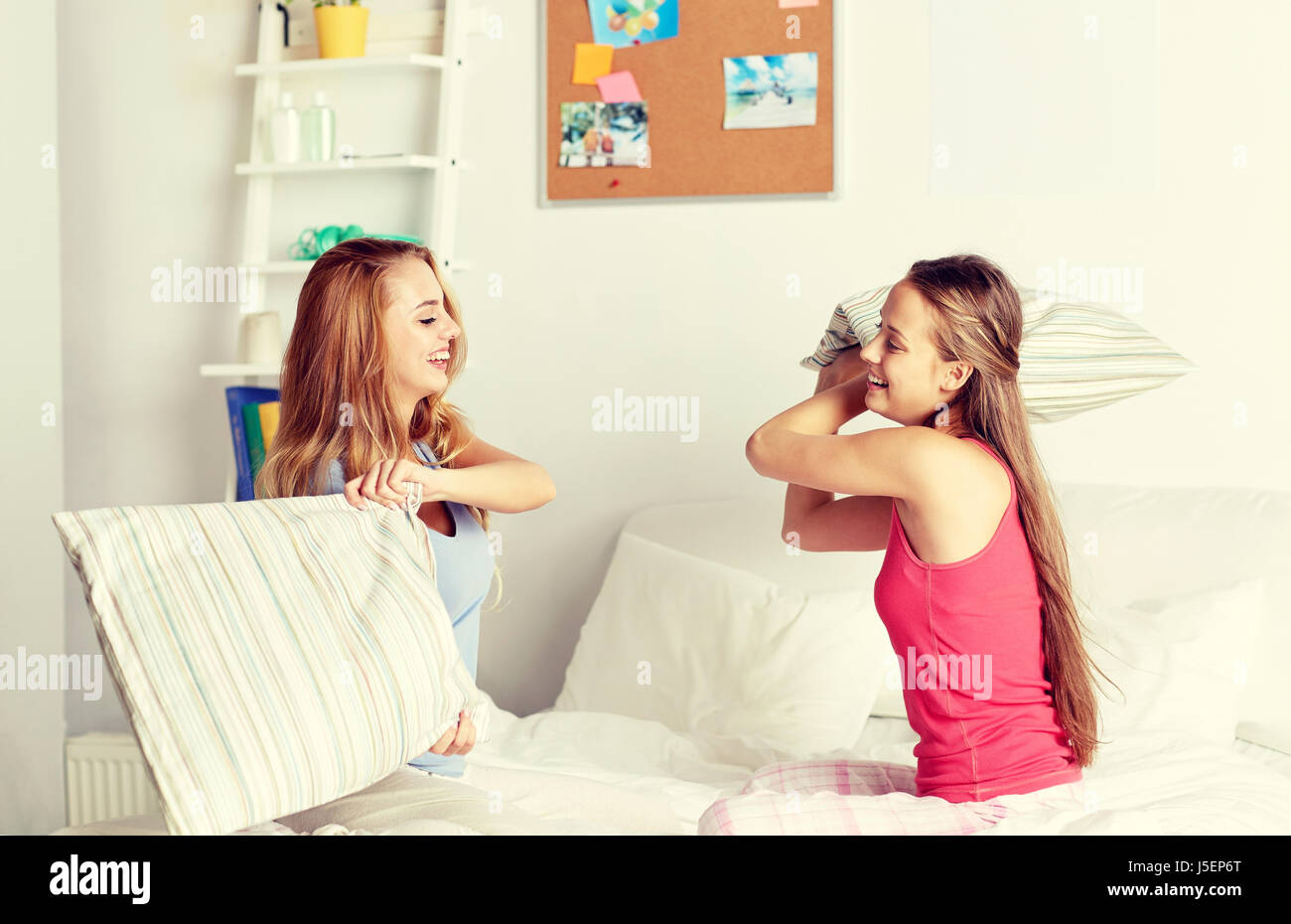 Happy teen girl friends fighting hi-res stock photography and images ...