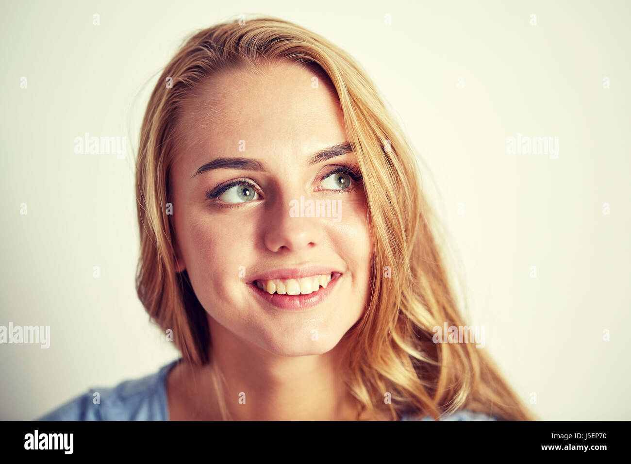 happy young woman face Stock Photo - Alamy
