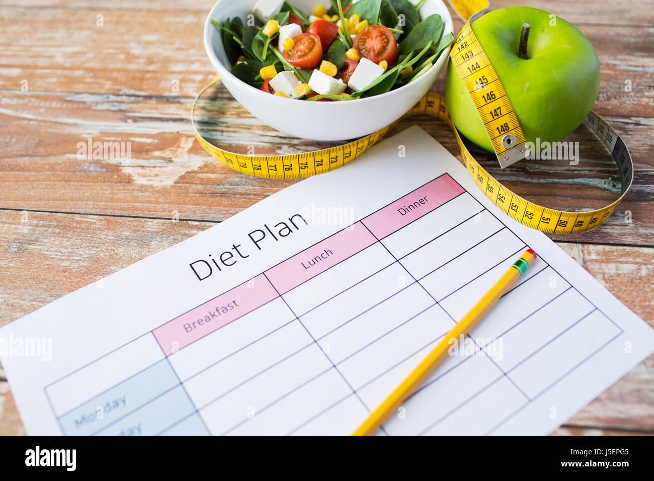 close up of diet plan and food on table Stock Photo - Alamy