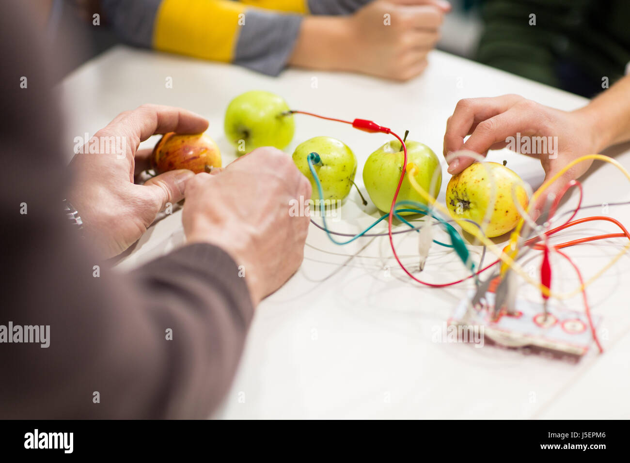 kids hands with invention kit at robotics school Stock Photo - Alamy