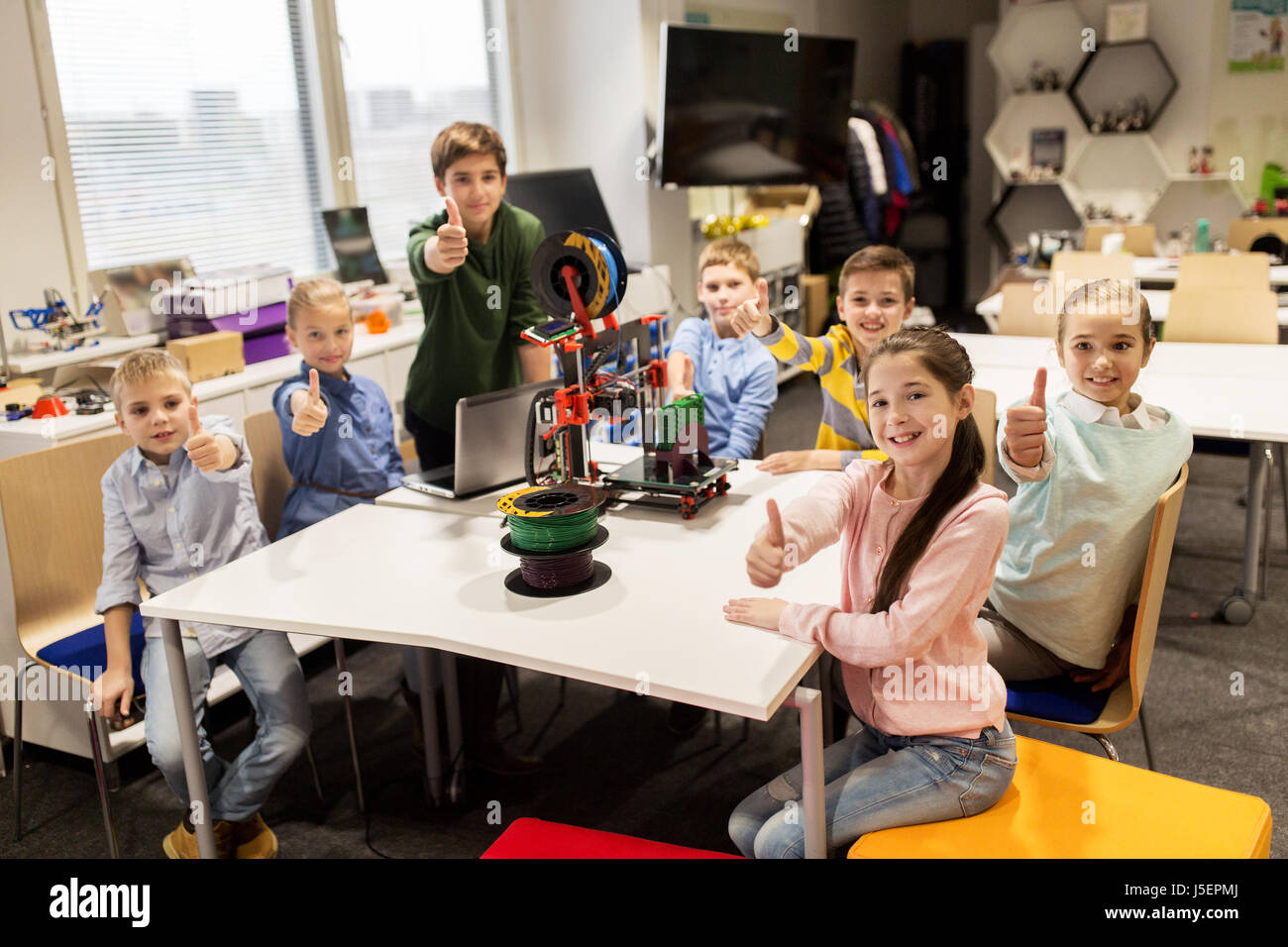 happy children with 3d printer at robotics school Stock Photo - Alamy
