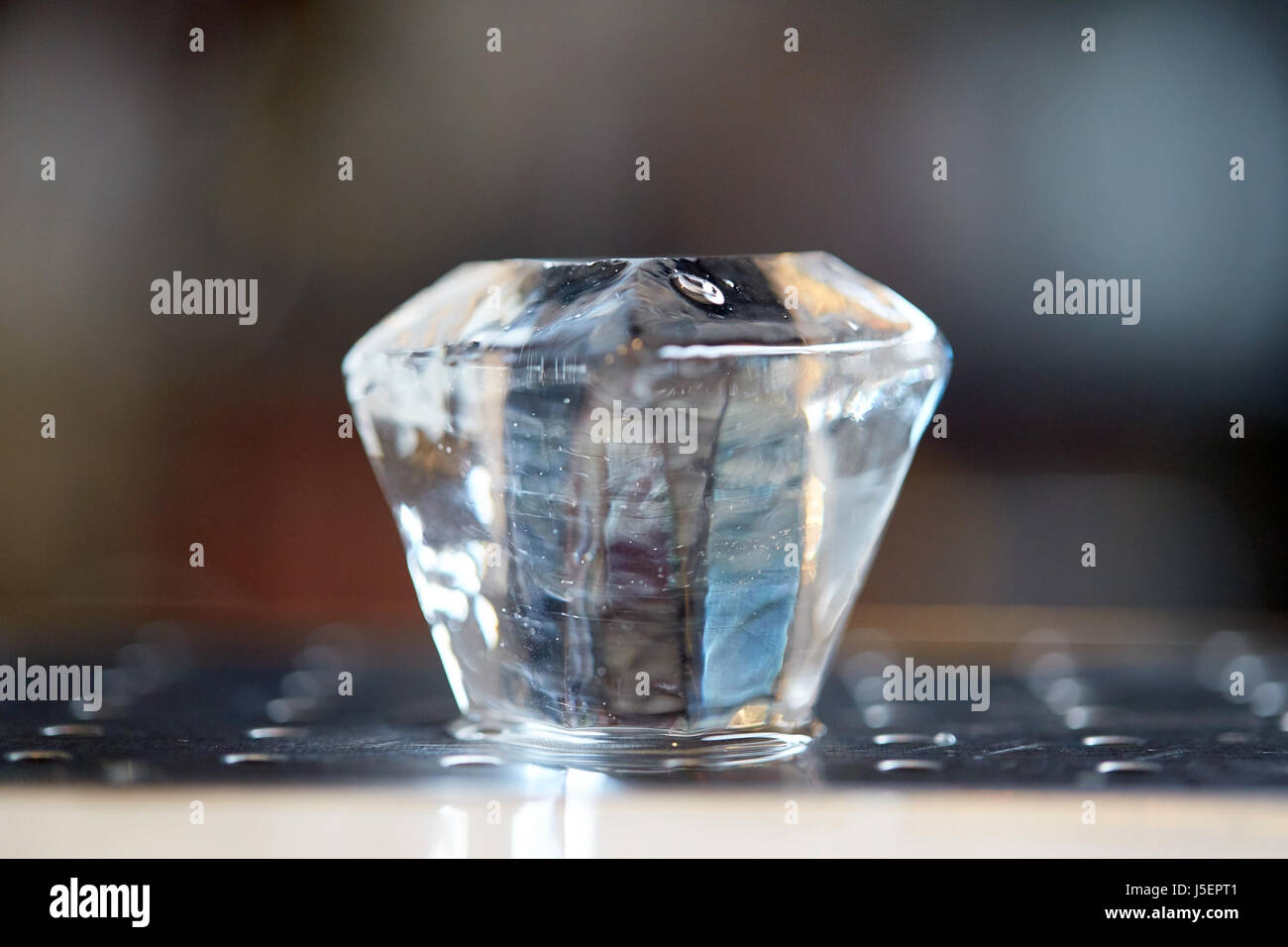 curved ice cube at bar Stock Photo - Alamy