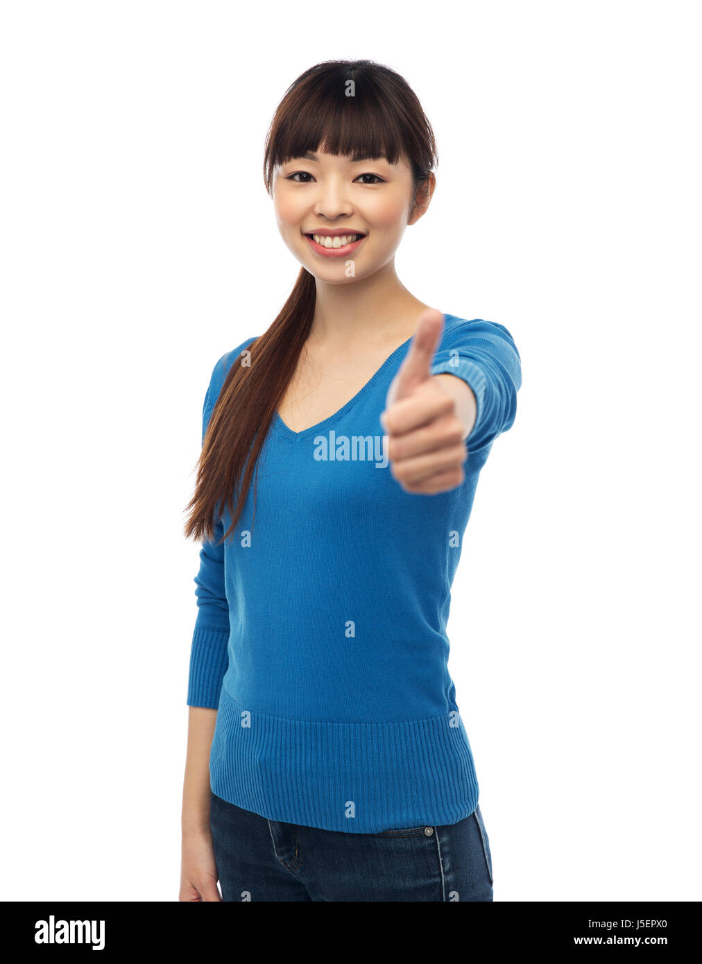 happy smiling young woman showing thumbs up Stock Photo - Alamy