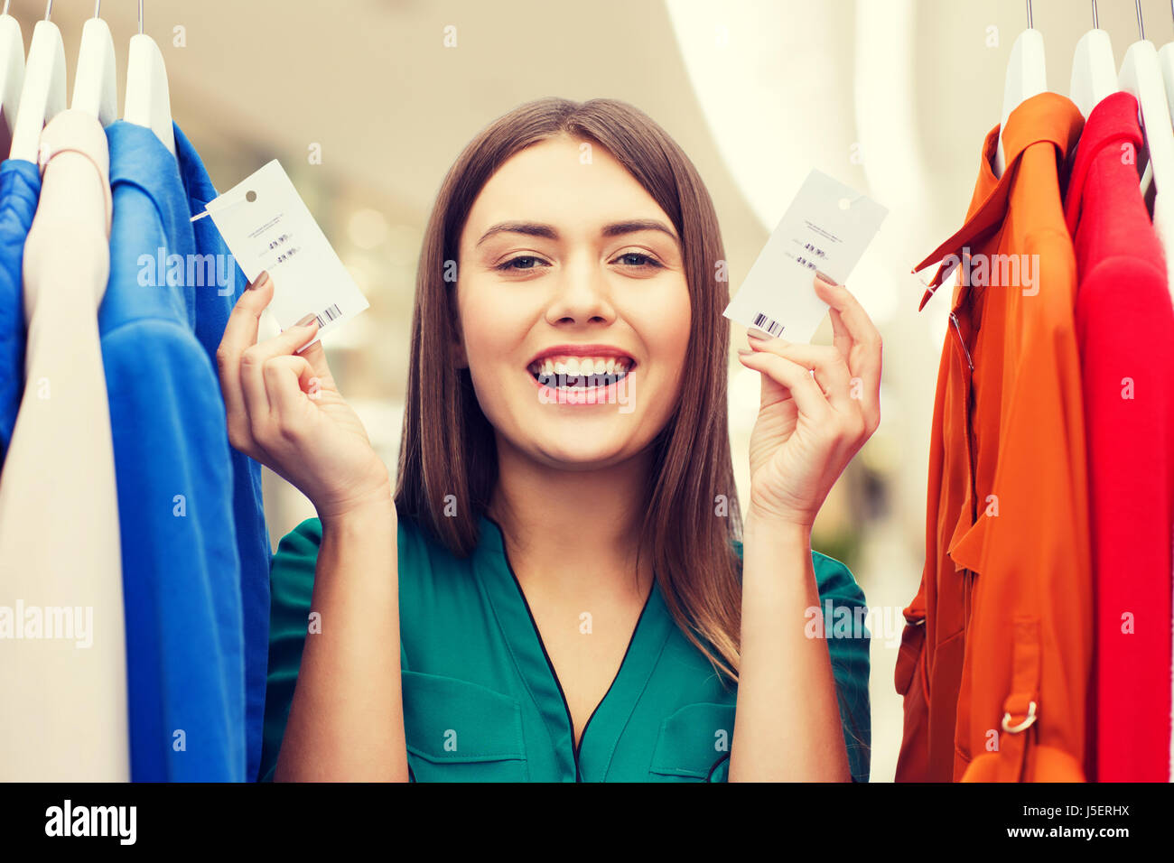 Teen girl shopping clothes price tag hi-res stock photography and ...