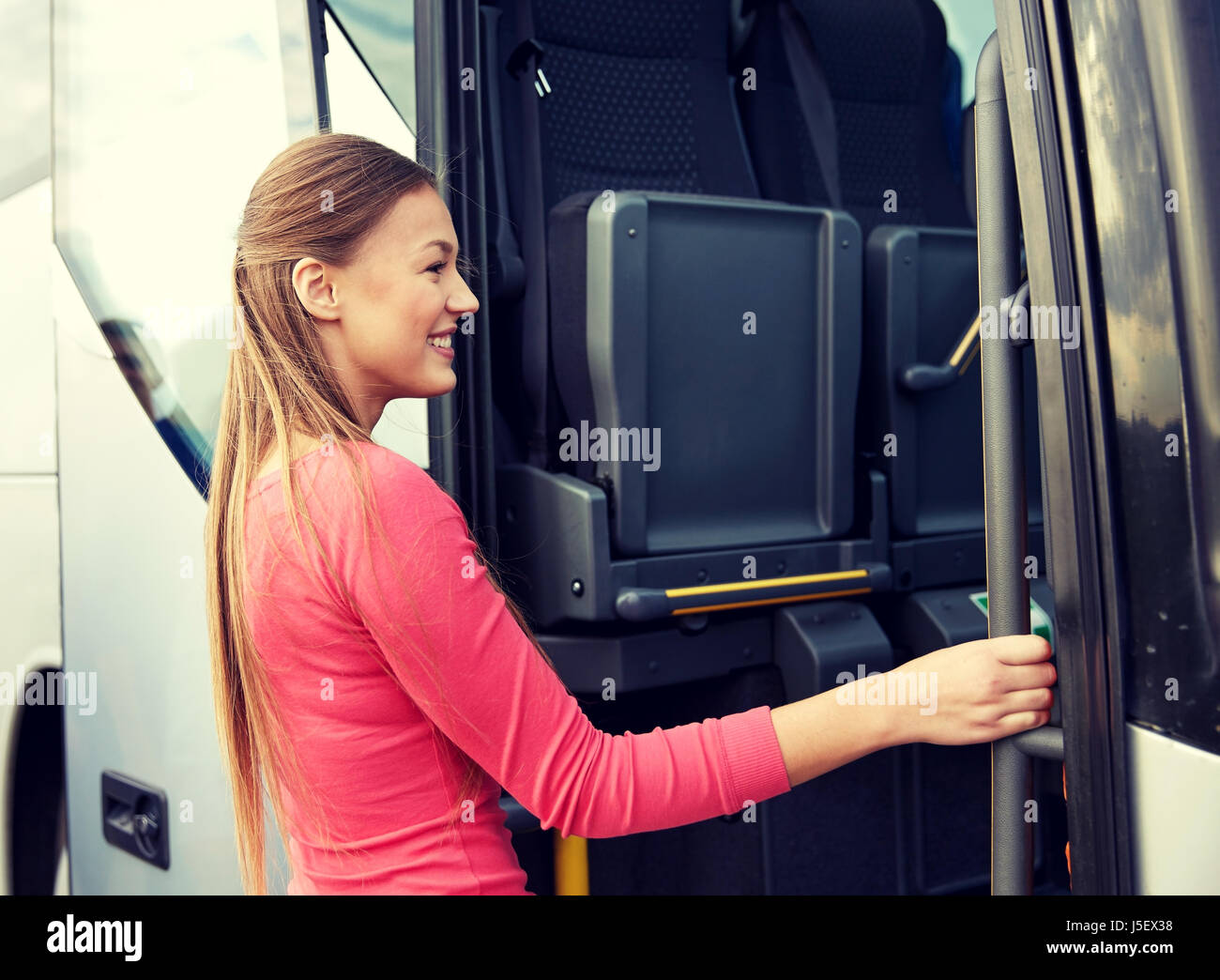 happy passenger boarding on travel bus Stock Photo - Alamy