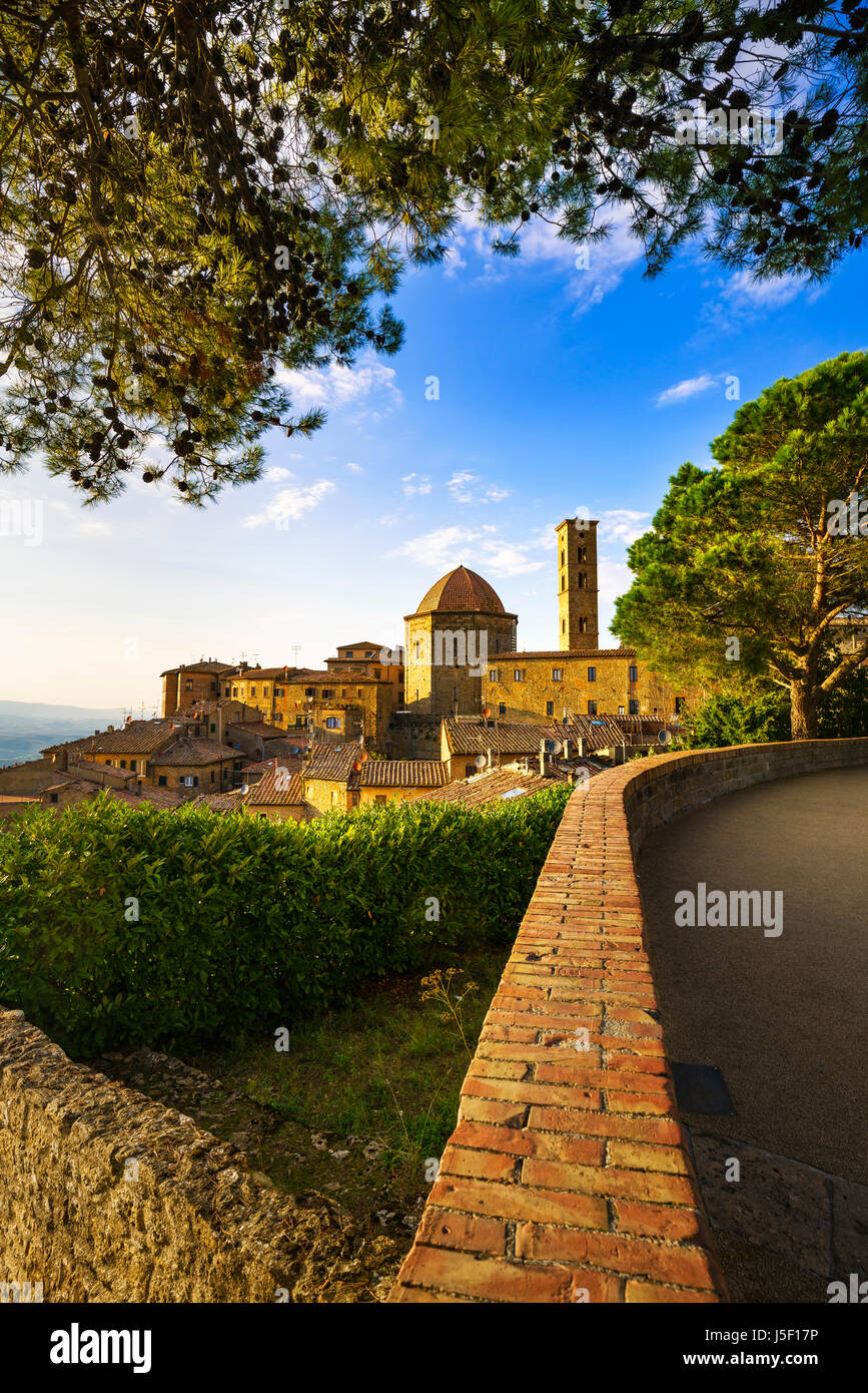 Tuscany, Volterra town skyline, church and trees on sunset. Maremma ...