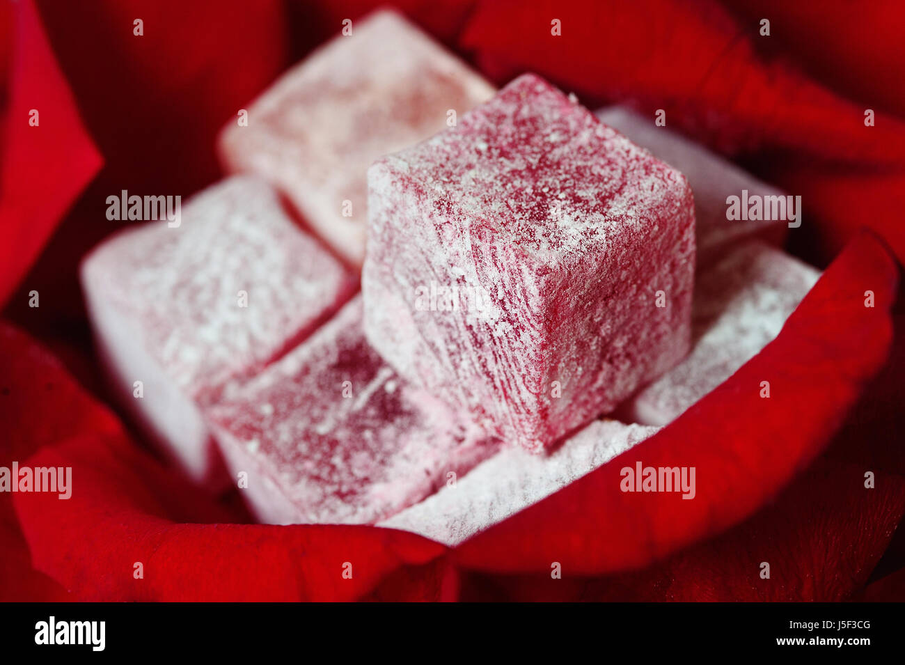 rose flavoured turkish delight with red rose petals Stock Photo - Alamy