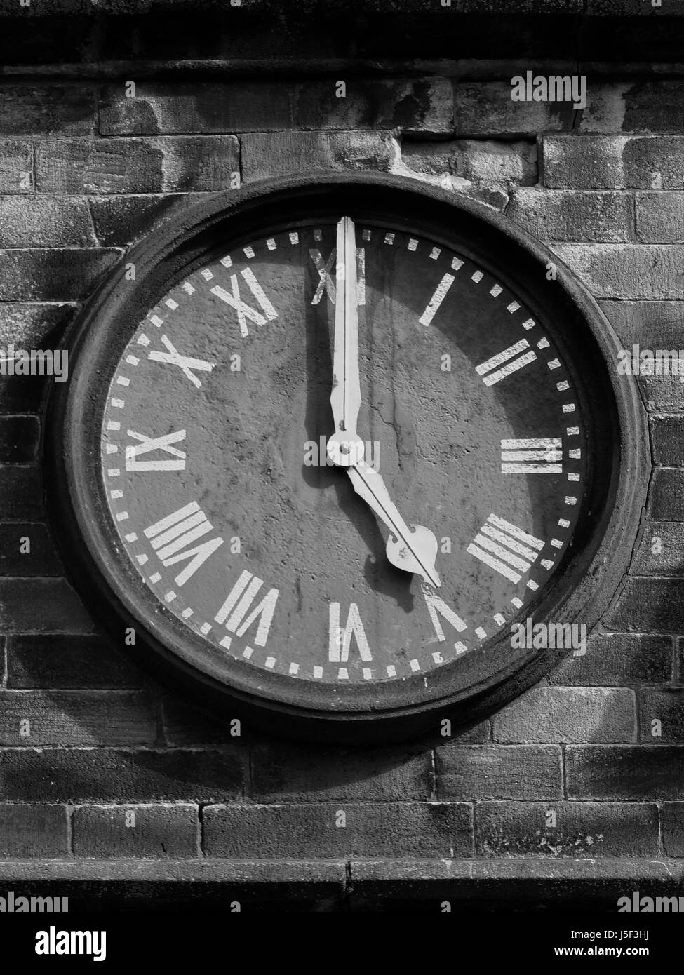 Clock on stone Black and White Stock Photos & Images - Alamy