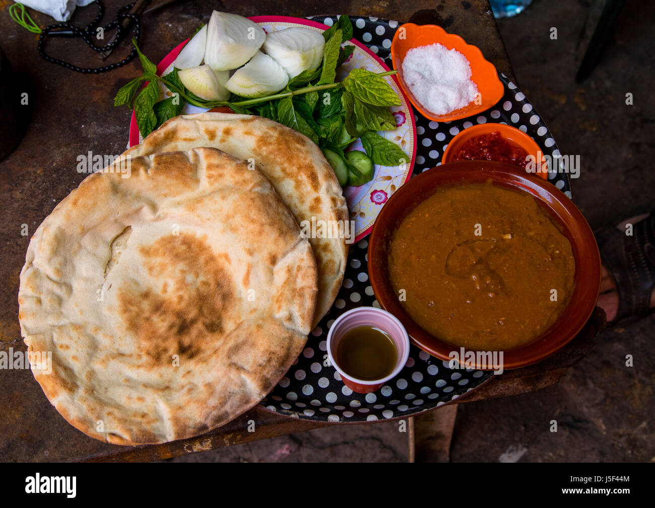 Traditional breakfast with foul beans and bread, South Governorate ...