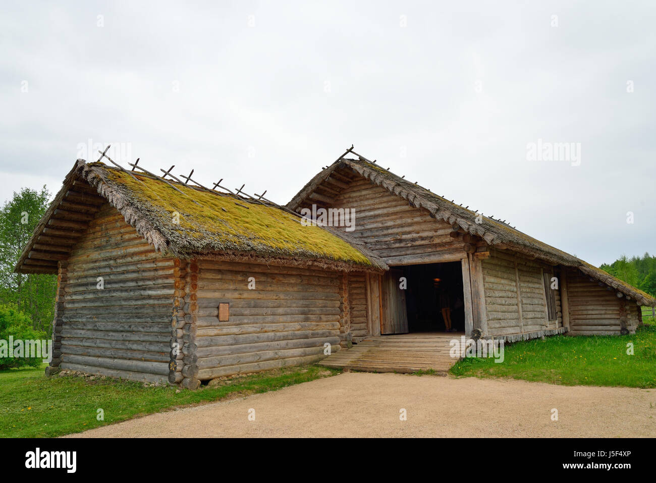 Old wooden log barn in the Museum of Pushkin Mikhailovskoe village ...