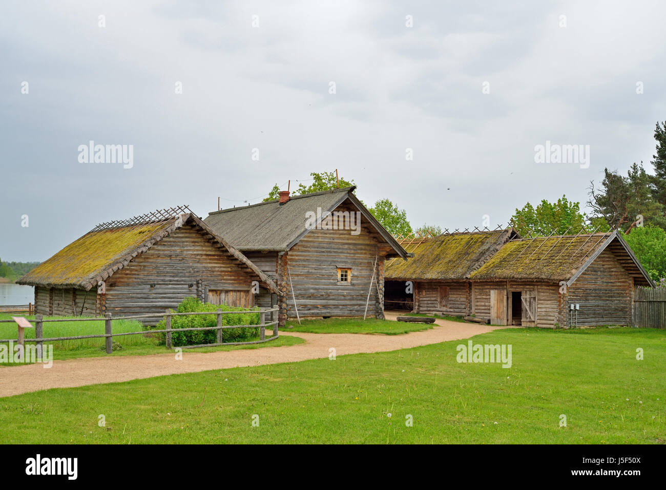 Old Russian log hut in Pushkin Mikhailovskoe summer cloudy day Stock ...