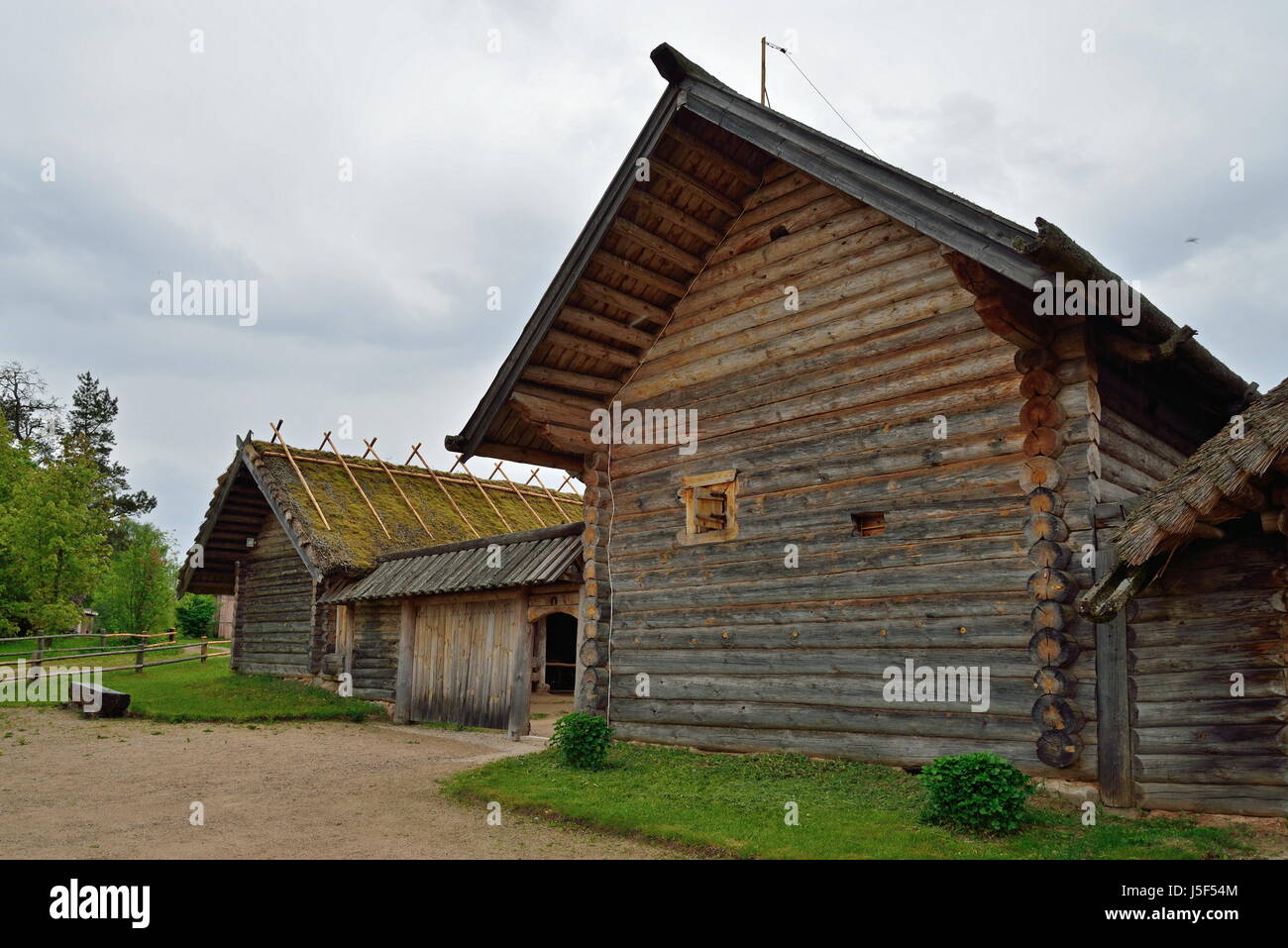 Old Russian log hut in Pushkin Mikhailovskoe summer cloudy day Stock ...