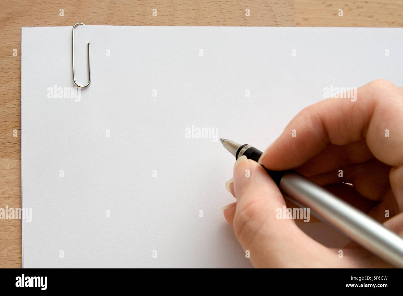 Office slip of paper hand hi-res stock photography and images - Alamy