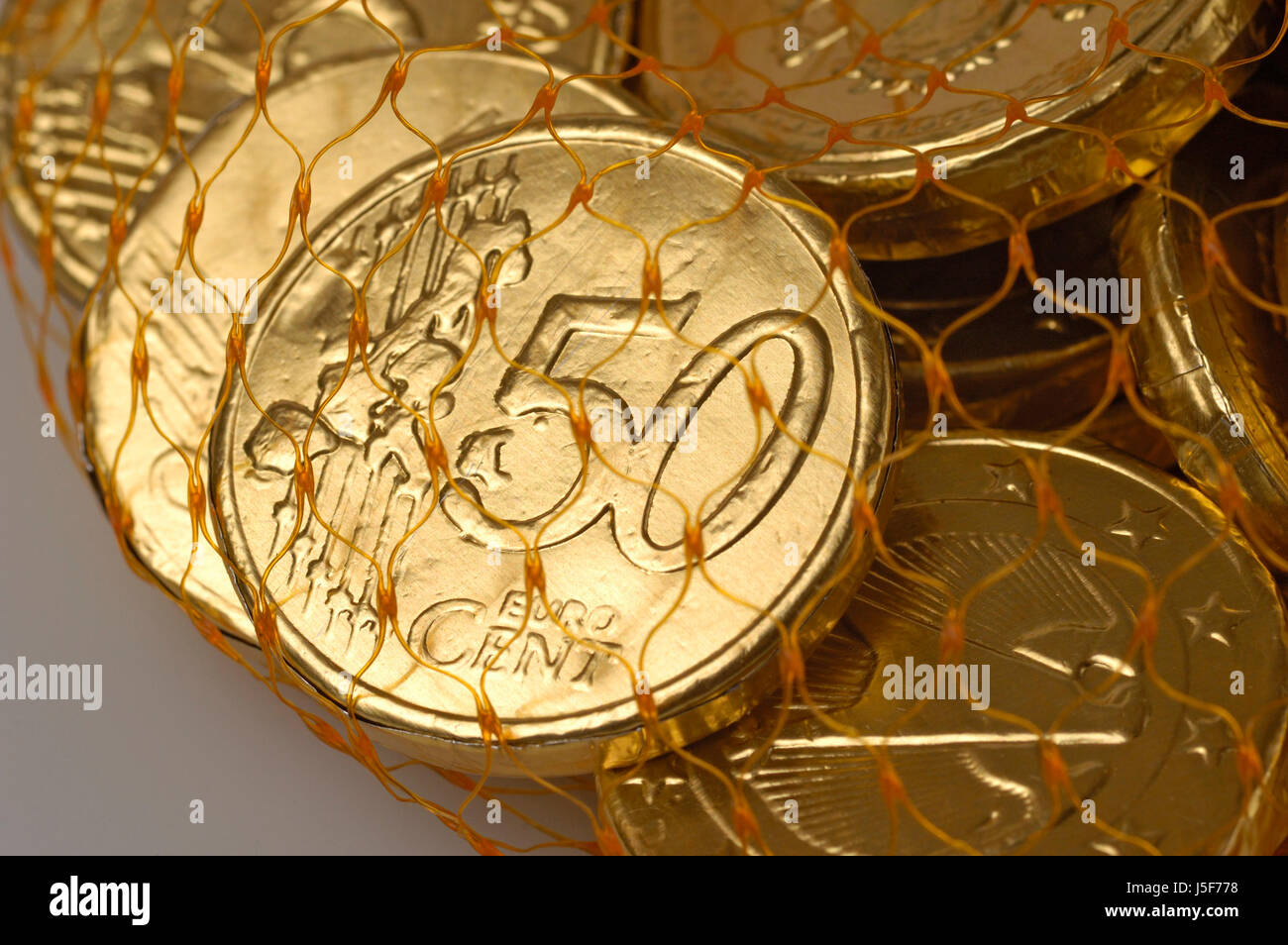 euro coins made of chocolate Stock Photo - Alamy