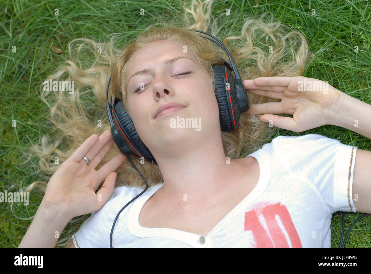 young woman relaxed with music Stock Photo - Alamy
