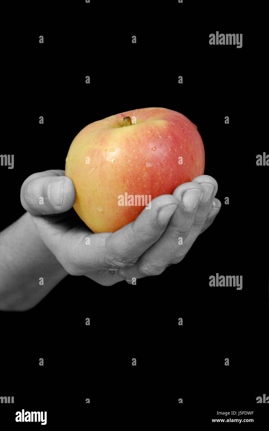 hand with apple Stock Photo - Alamy